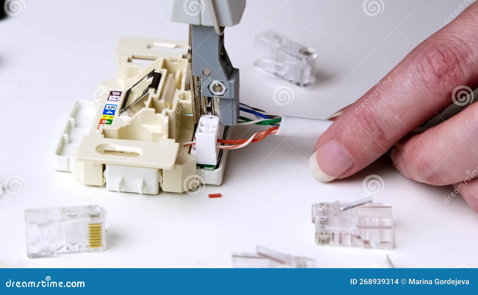 Installing a Network Cable into a Prefabricated RJ45 Module Using the ...