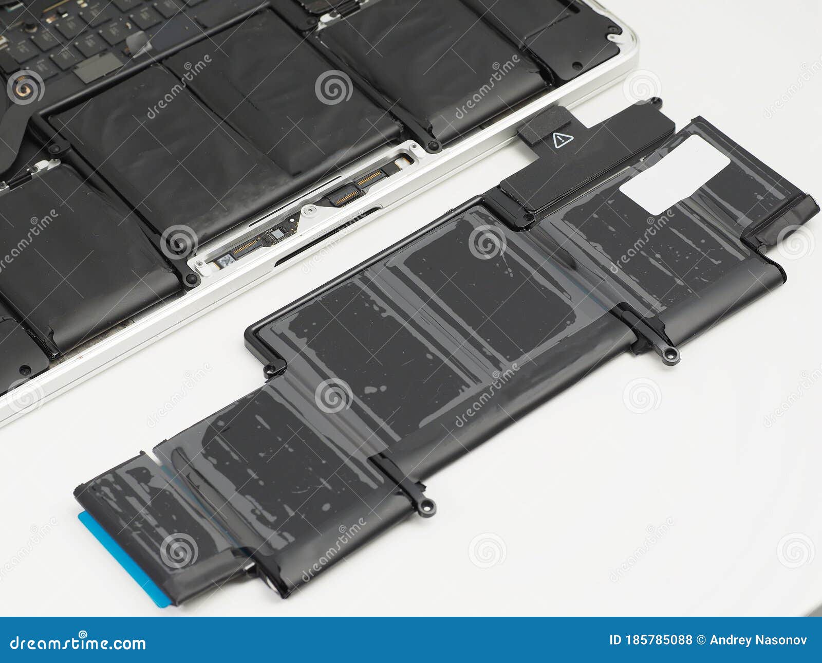 Installing a New Battery in Laptop. Stock Photo - Image of power ...