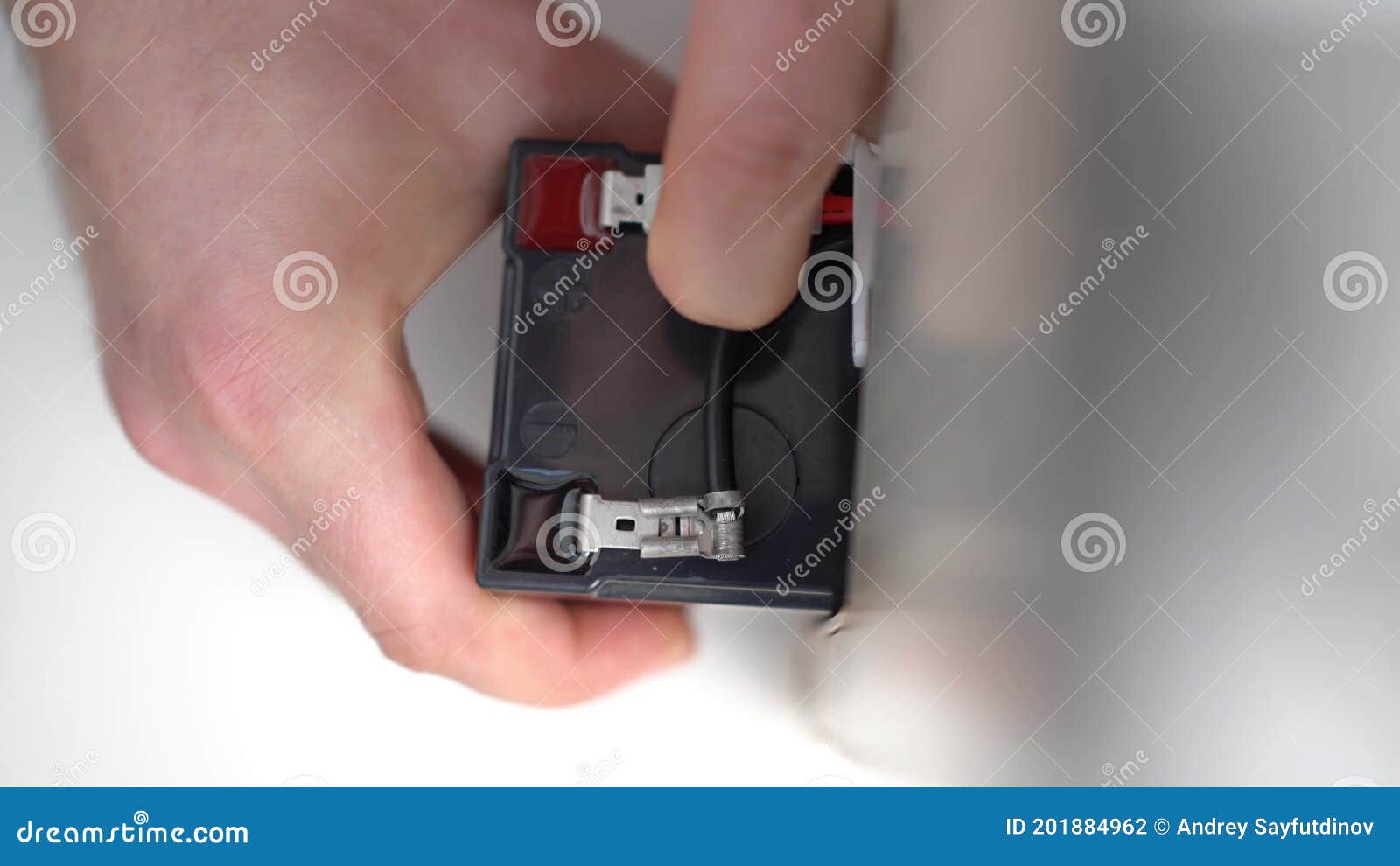 Installing a New Battery Pack in an Uninterruptible Power Supply. Stock ...