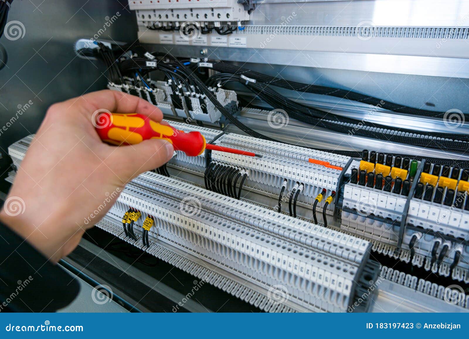 Installing a New Connector in Electric Cubicle. Stock Image - Image of ...