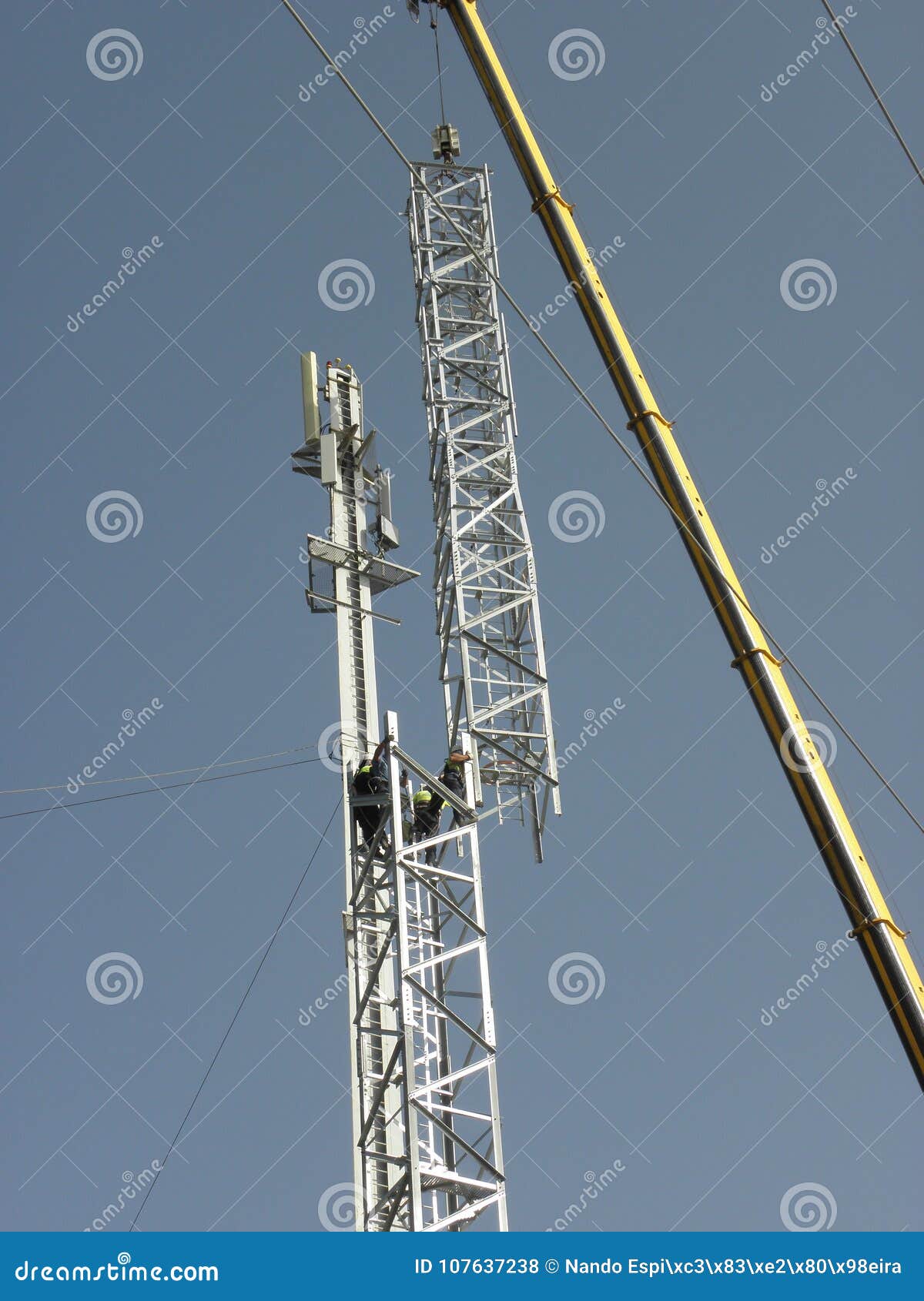 Assembling a Telecommunications Tower in Parts Stock Photo - Image of ...