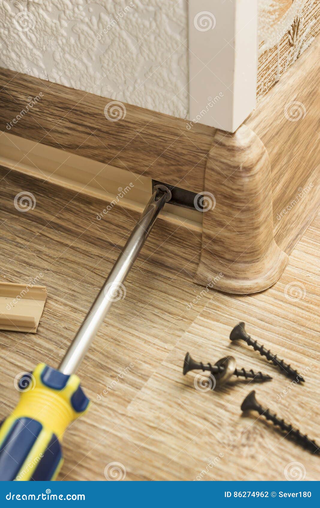 Installing Plinth at Corner of Room Stock Photo - Image of corner ...