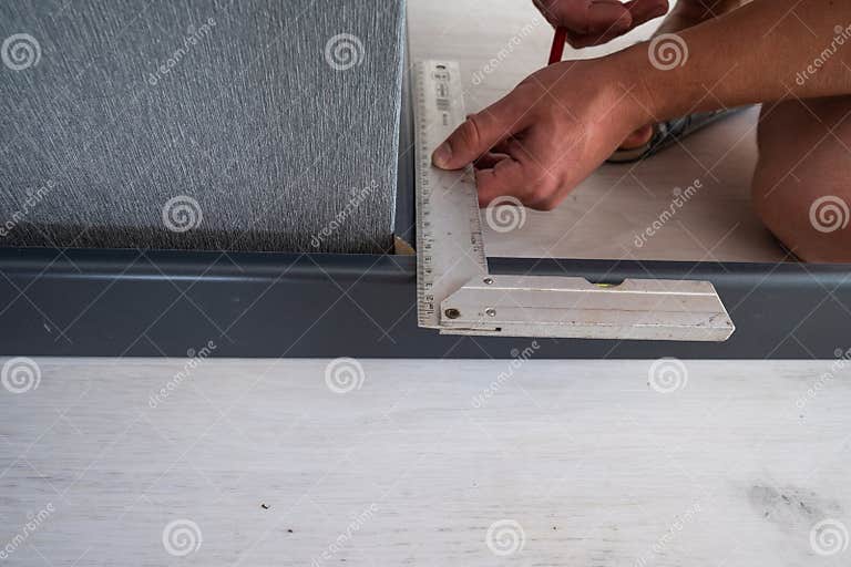 Installing a Plinth in the Room, Measuring the Required Length Using a ...