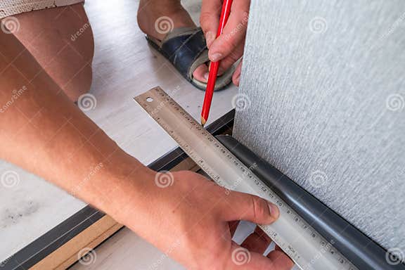 Installing a Plinth in the Room, Measuring the Required Length Using a ...