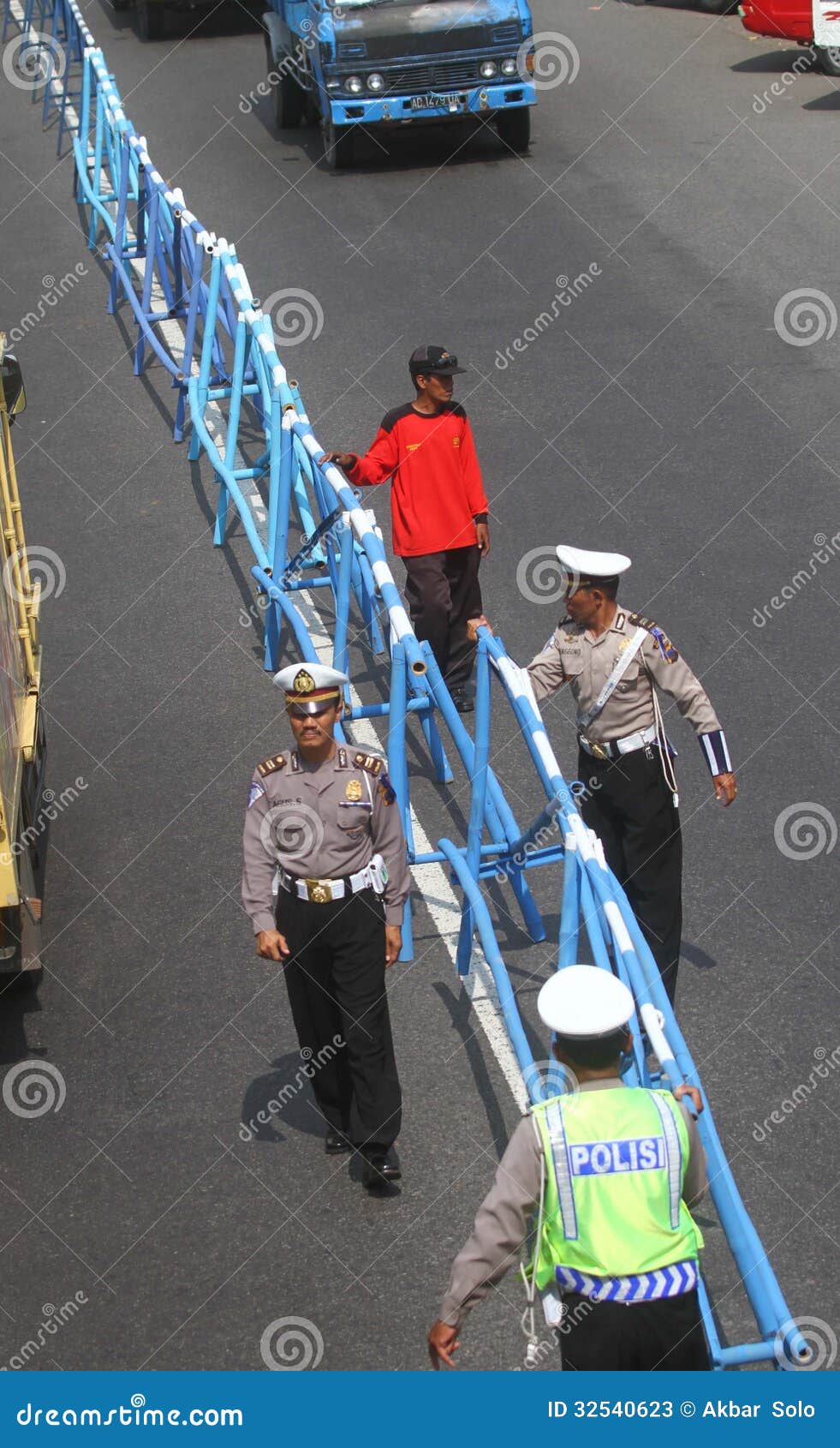 Installing roadblock editorial stock photo. Image of indonesia - 32540623