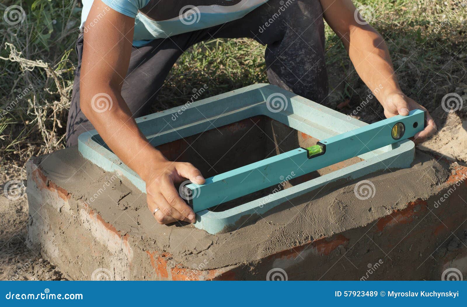 Installing sewer manhole stock image. Image of level - 57923489