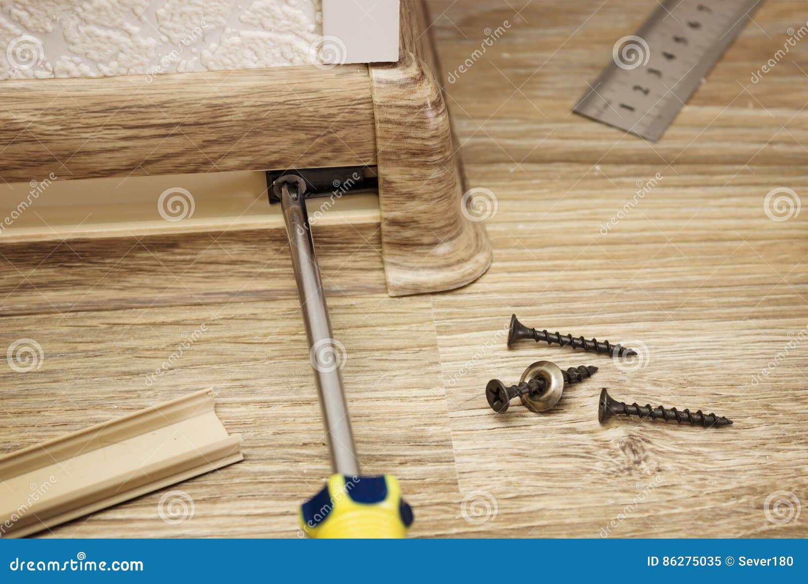 Installing A Corner Skirting Board On A Wooden Kitchen Countertop ...