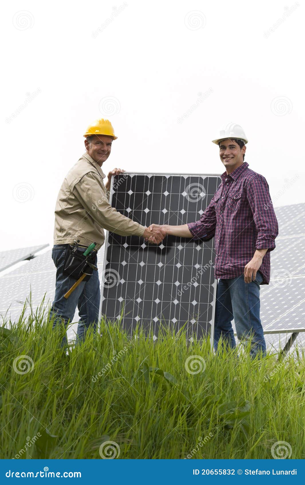 Installing A Solar Cell On A Field. Solar Panels On Field. Stock ...