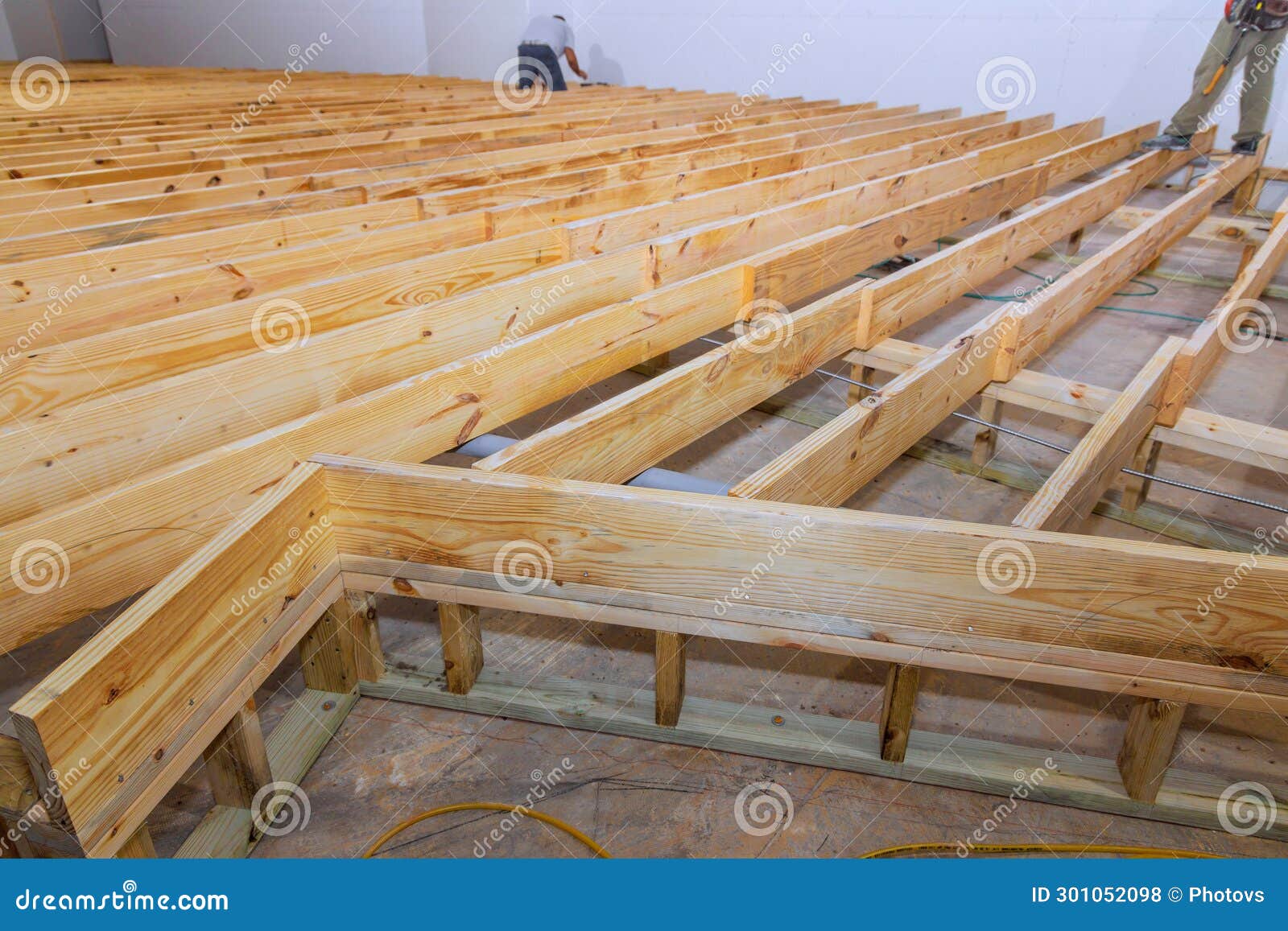 Installing a Stage Indoors Using Wooden Frame Beams Mounted on Wooden ...
