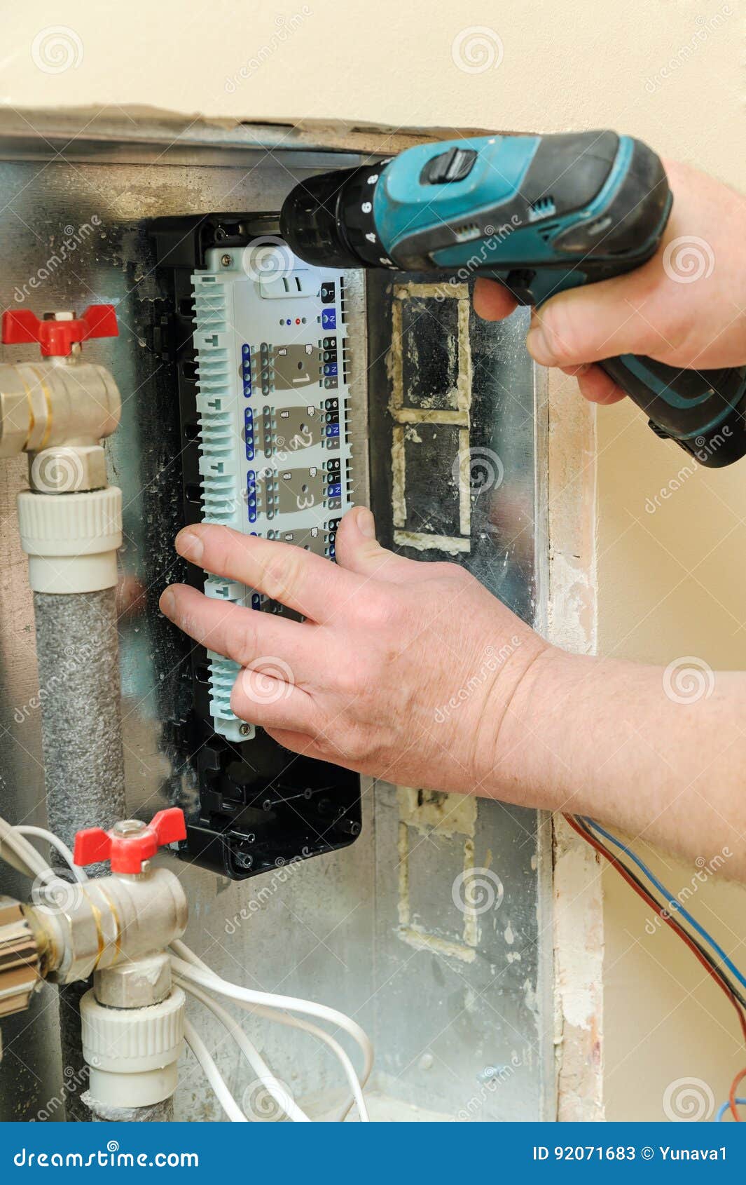Installing Switch for a Home Heating System. Stock Image - Image of ...