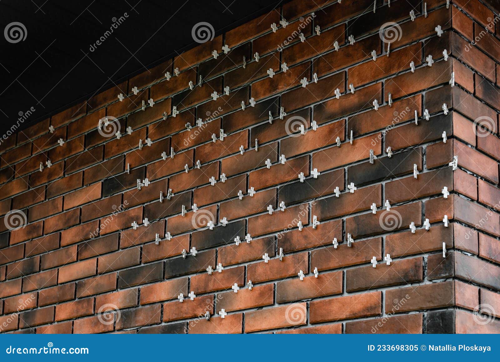 Installing the Tiles in the Form of Brick on the Wall Using Plastic ...