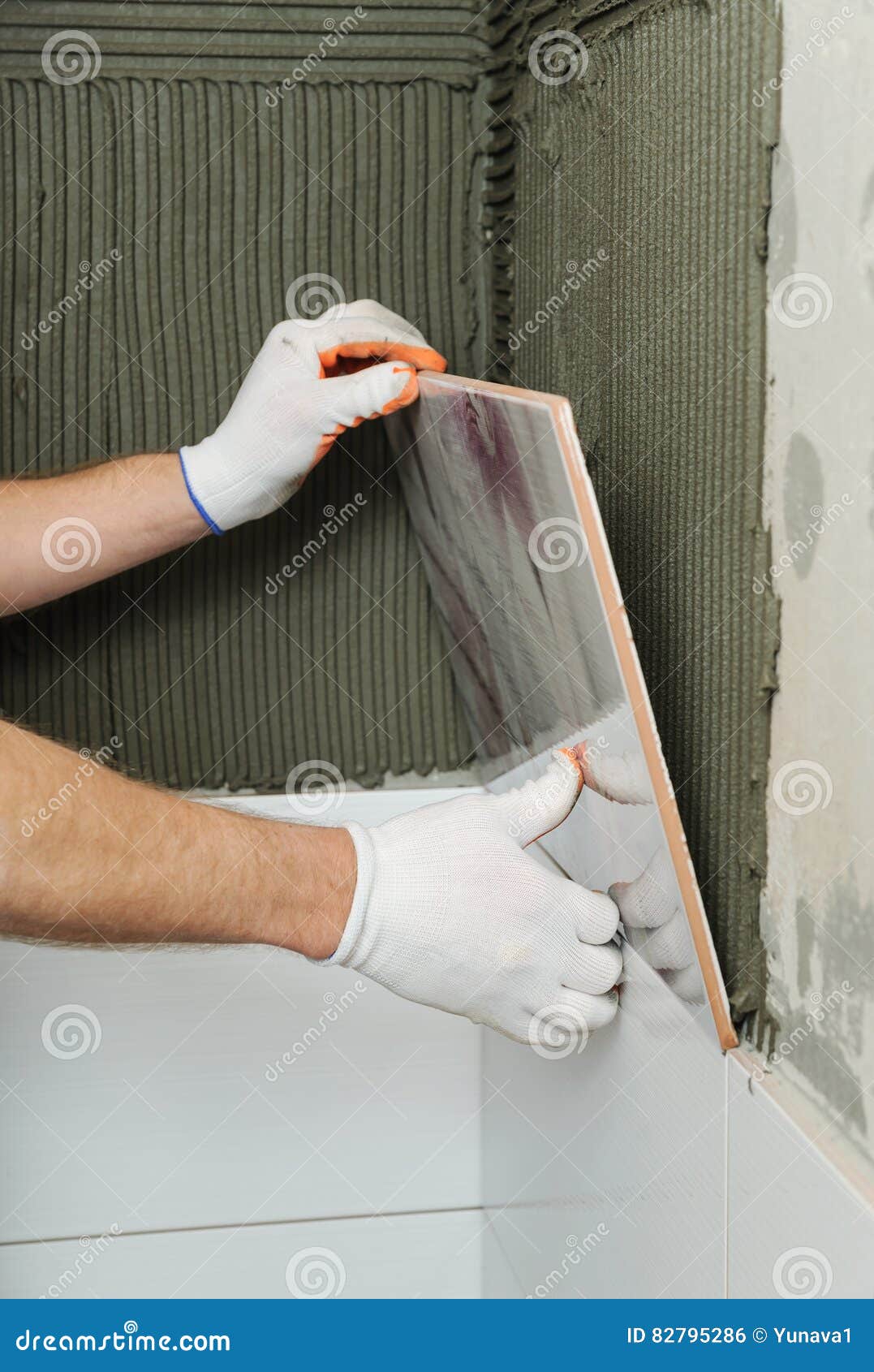 Installing the Tiles on the Wall. Stock Photo - Image of tiled, person ...