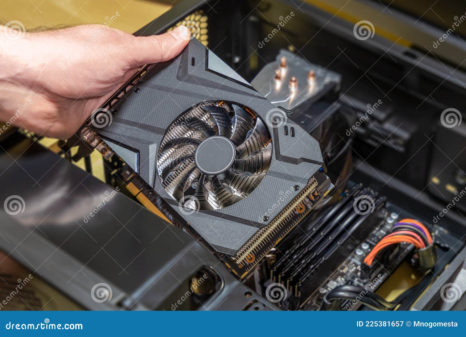 Installing a Video Card on the Motherboard. the Technician Installs ...