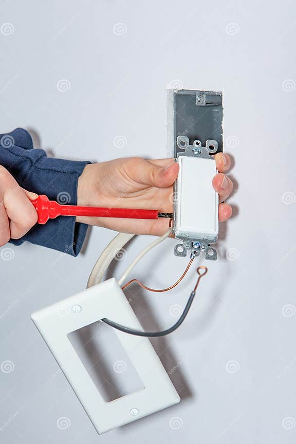 Installing a Wall Switch in a Drywall Stock Image - Image of ...