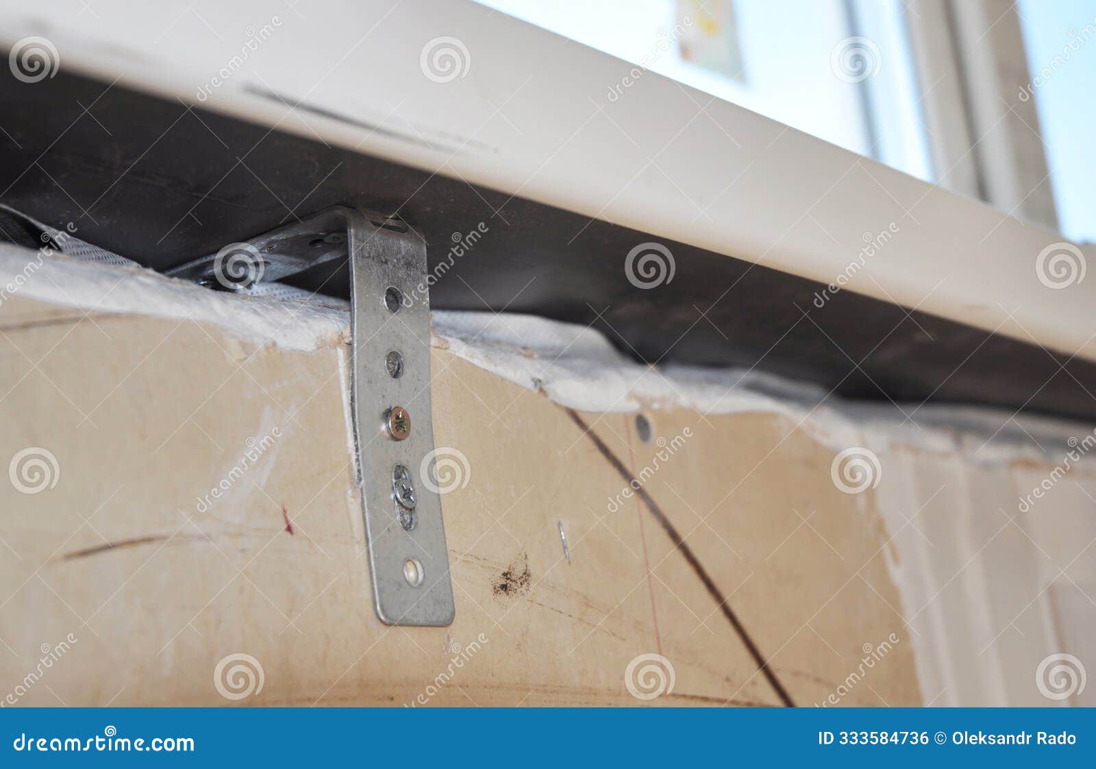 Installing a Window Sill in a New House. Close Up on Window Sill Holder ...