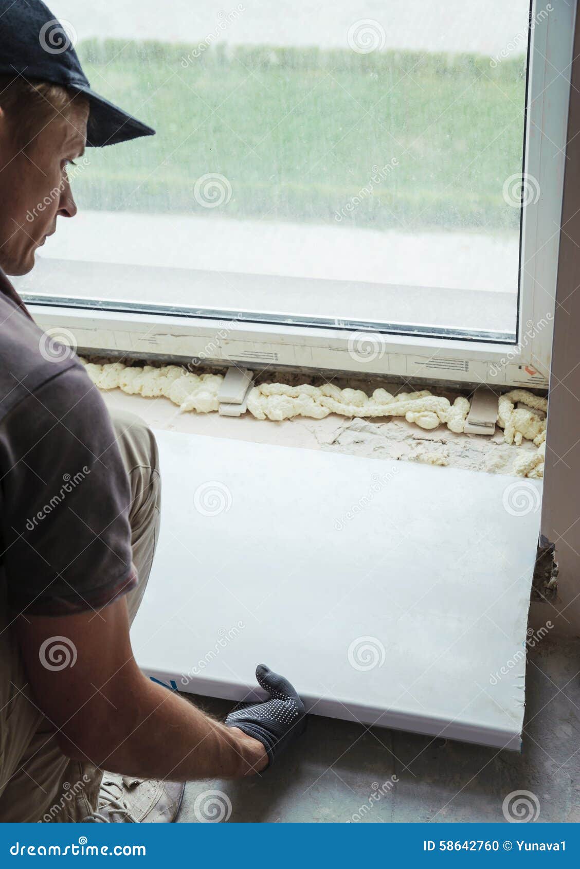 Installing window sill stock photo. Image of foam, buildings - 58642760