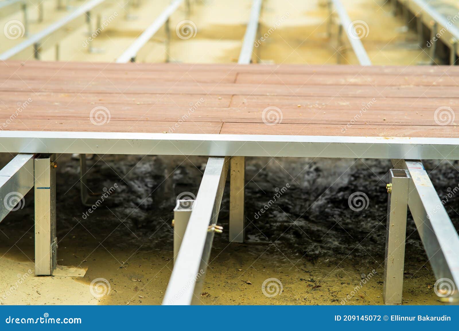 Installing Wooden Floor Platform in a Construction Site Stock Photo ...
