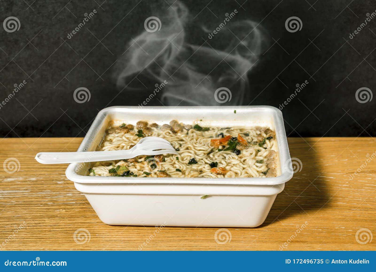 Instant Noodles in a Plastic Container with a Plastic Fork Stock Image ...