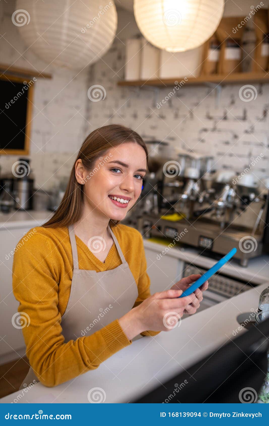 Smiling Barista Taking Orders Online Using the Tablet Stock Photo ...