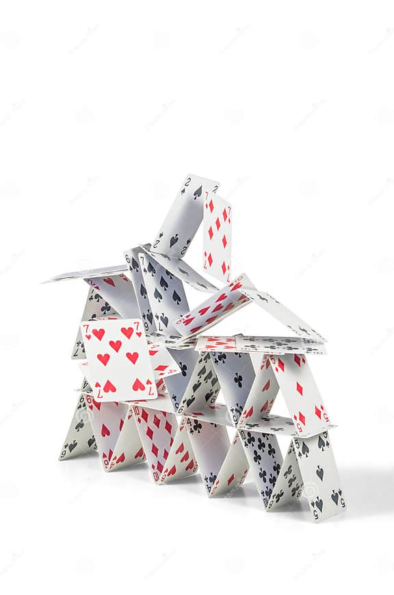 Instortend kaartenhuis stock foto. Image of vaardigheid - 25568104