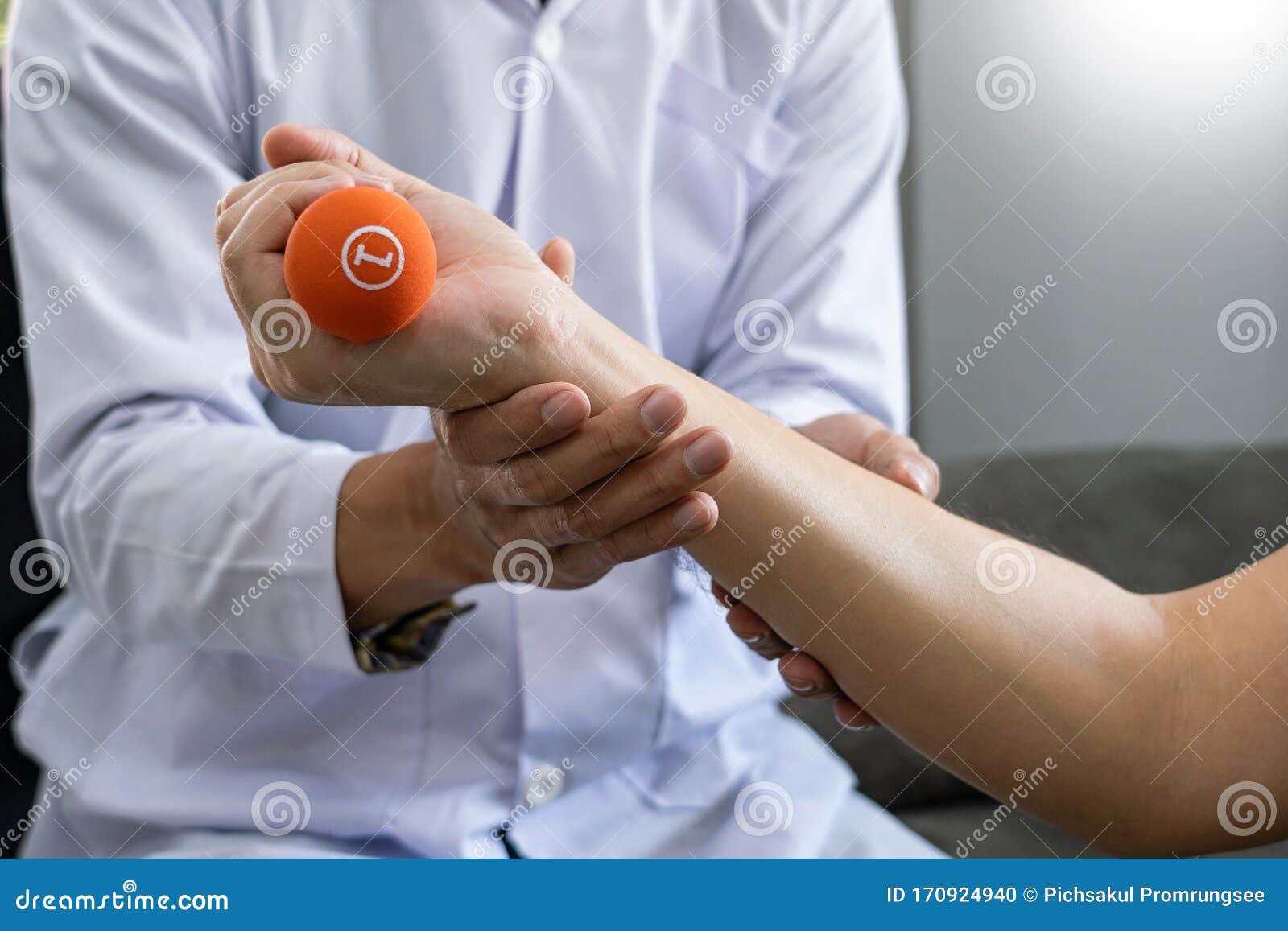 Instructor Assisting Senior Doing Exercise Working Out in Clinic ...
