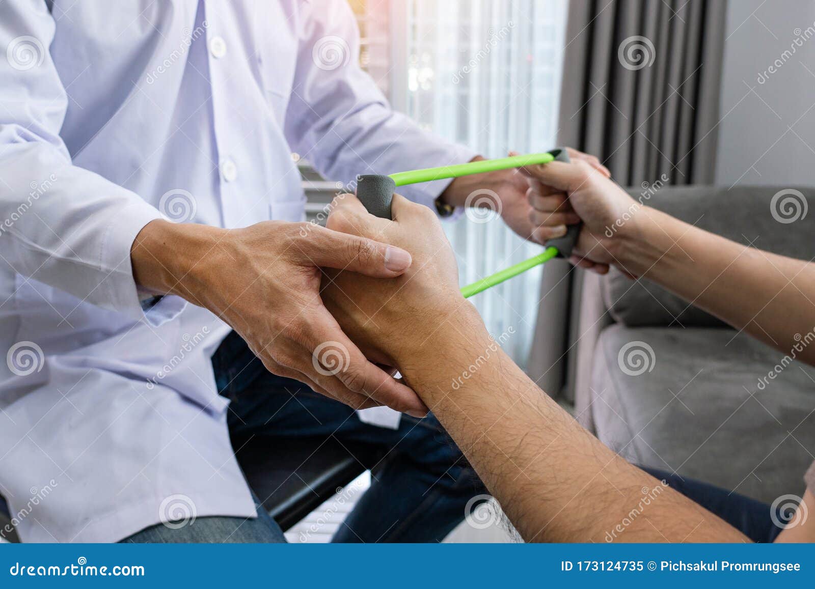 Instructor Assisting Senior Doing Exercise Working Out in Clinic ...