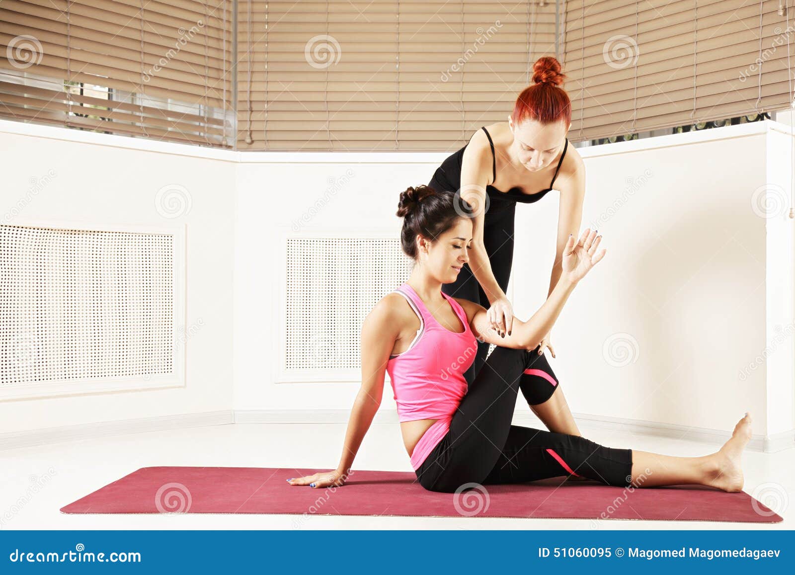 Instructor Corrects Students Pose Stock Image - Image of hatha ...