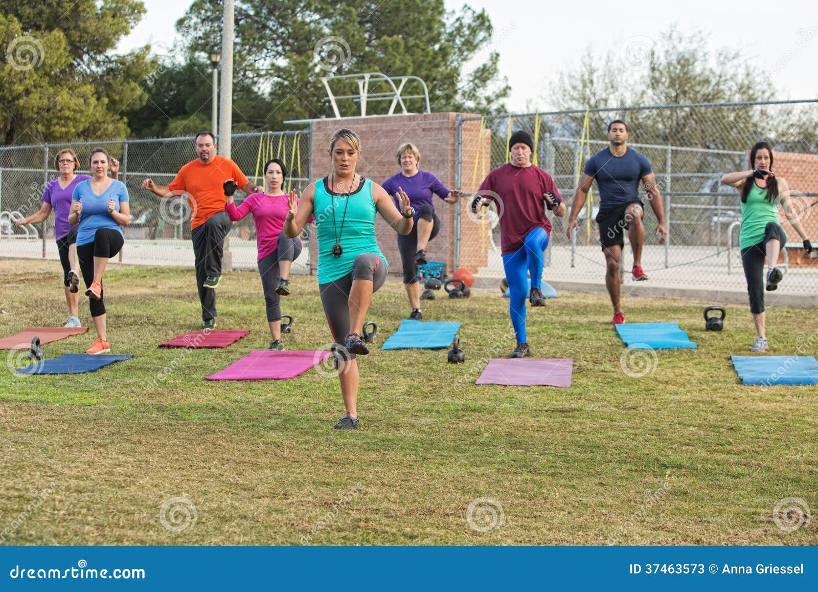 Instructor Exercising with Group Stock Image - Image of fitness ...
