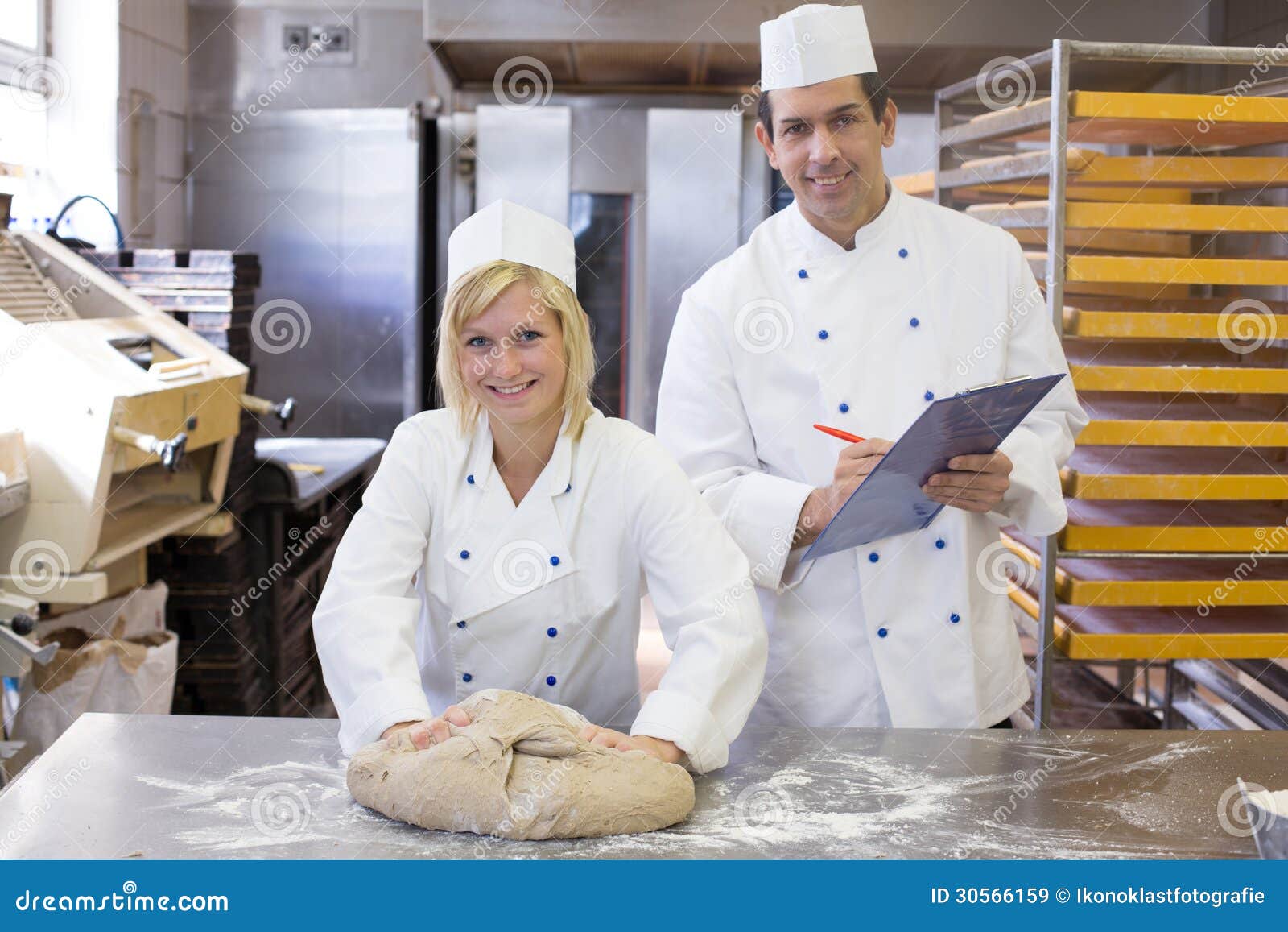 Instructor Instructing an Apprentice in Bakery Stock Image - Image of ...