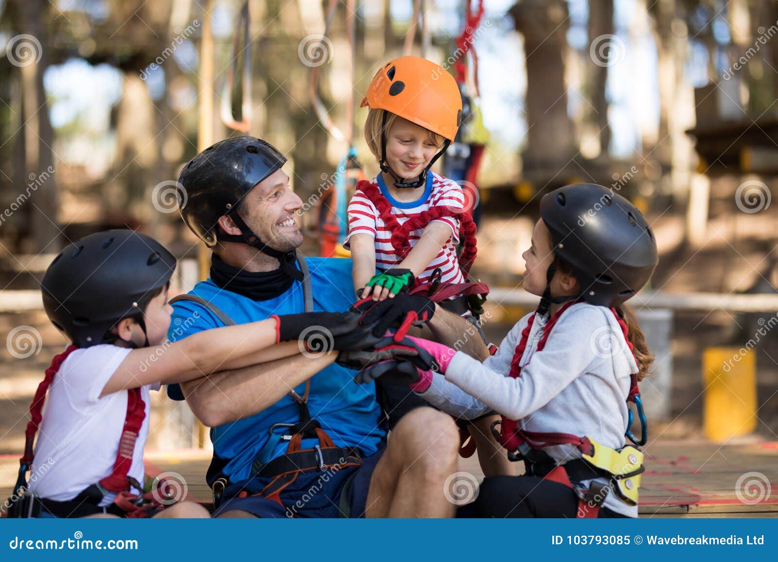 Instructor and Kids Forming Hand Stack in Park Stock Image - Image of ...