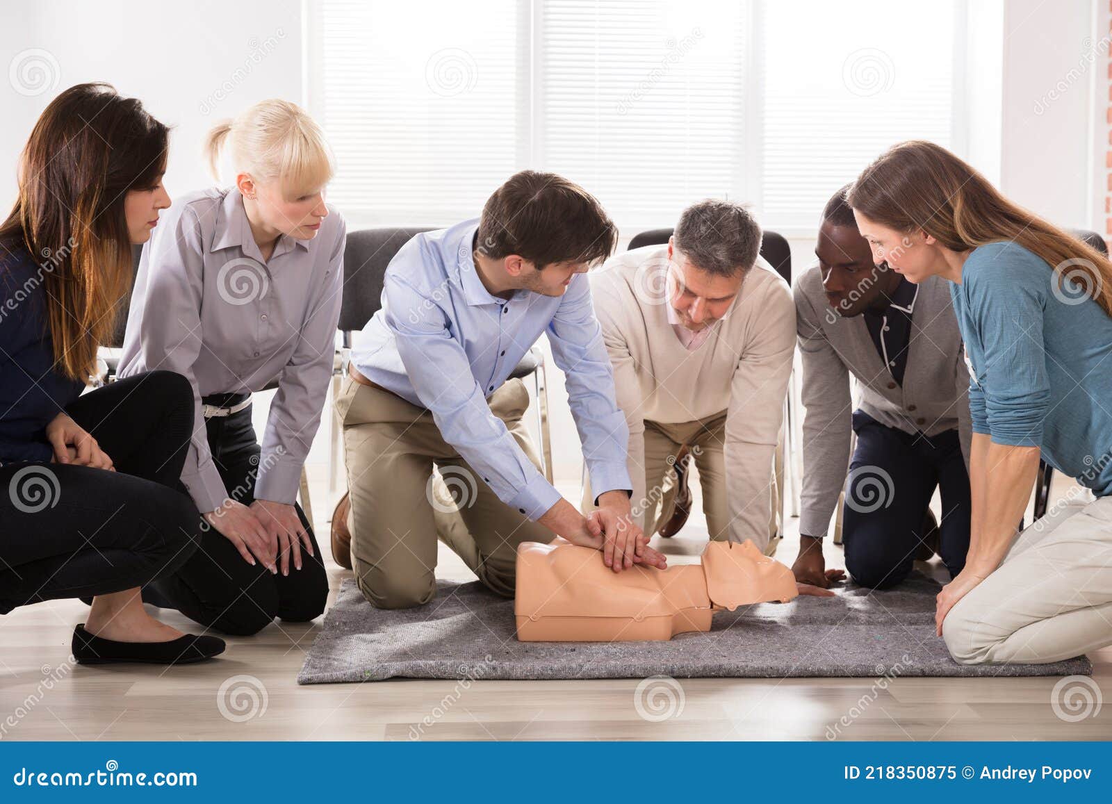 Instructor Performing Resuscitation Technique on Dummy Stock Image ...