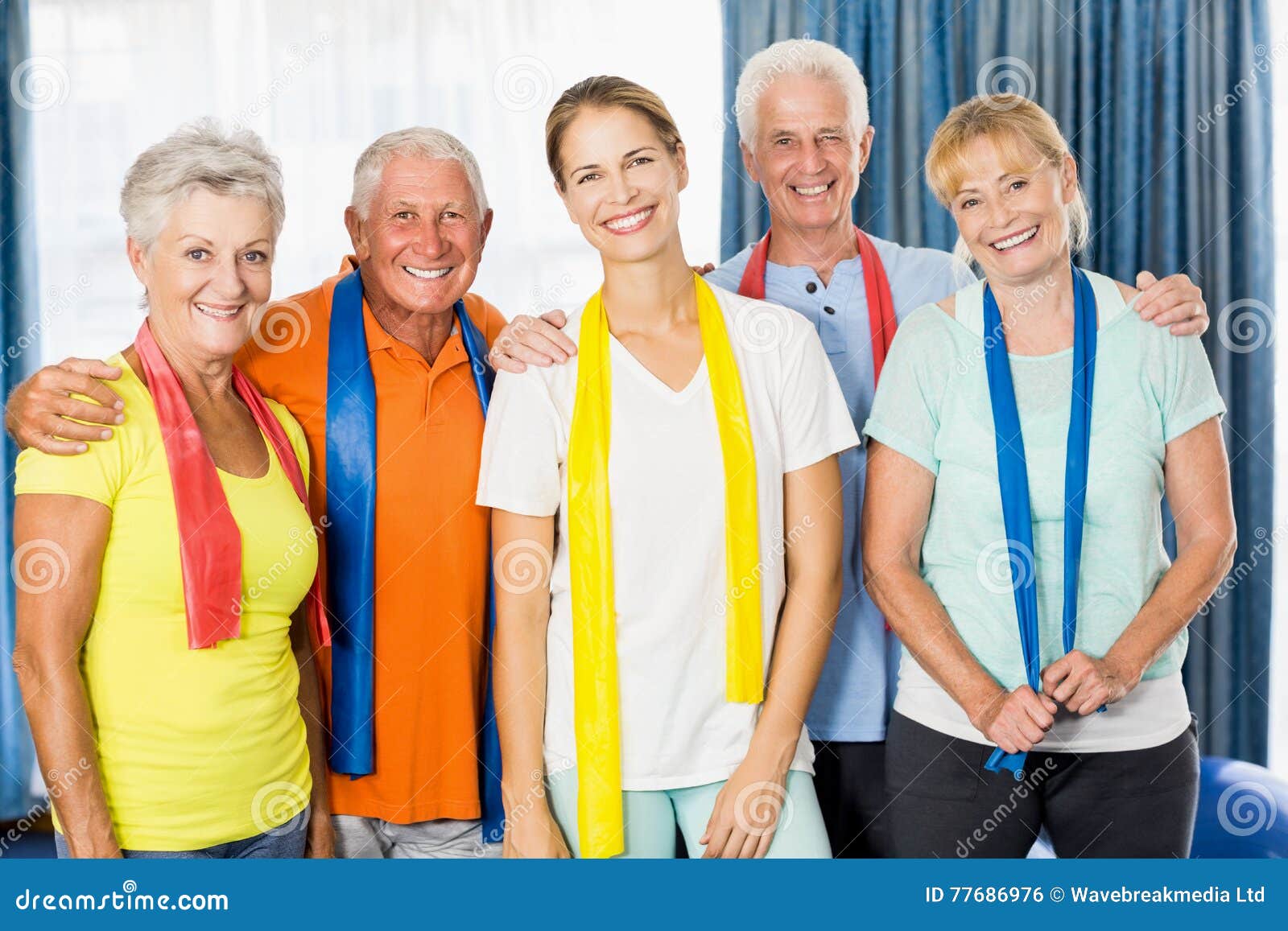 Instructor and Seniors with Stretching Bands Stock Photo - Image of ...