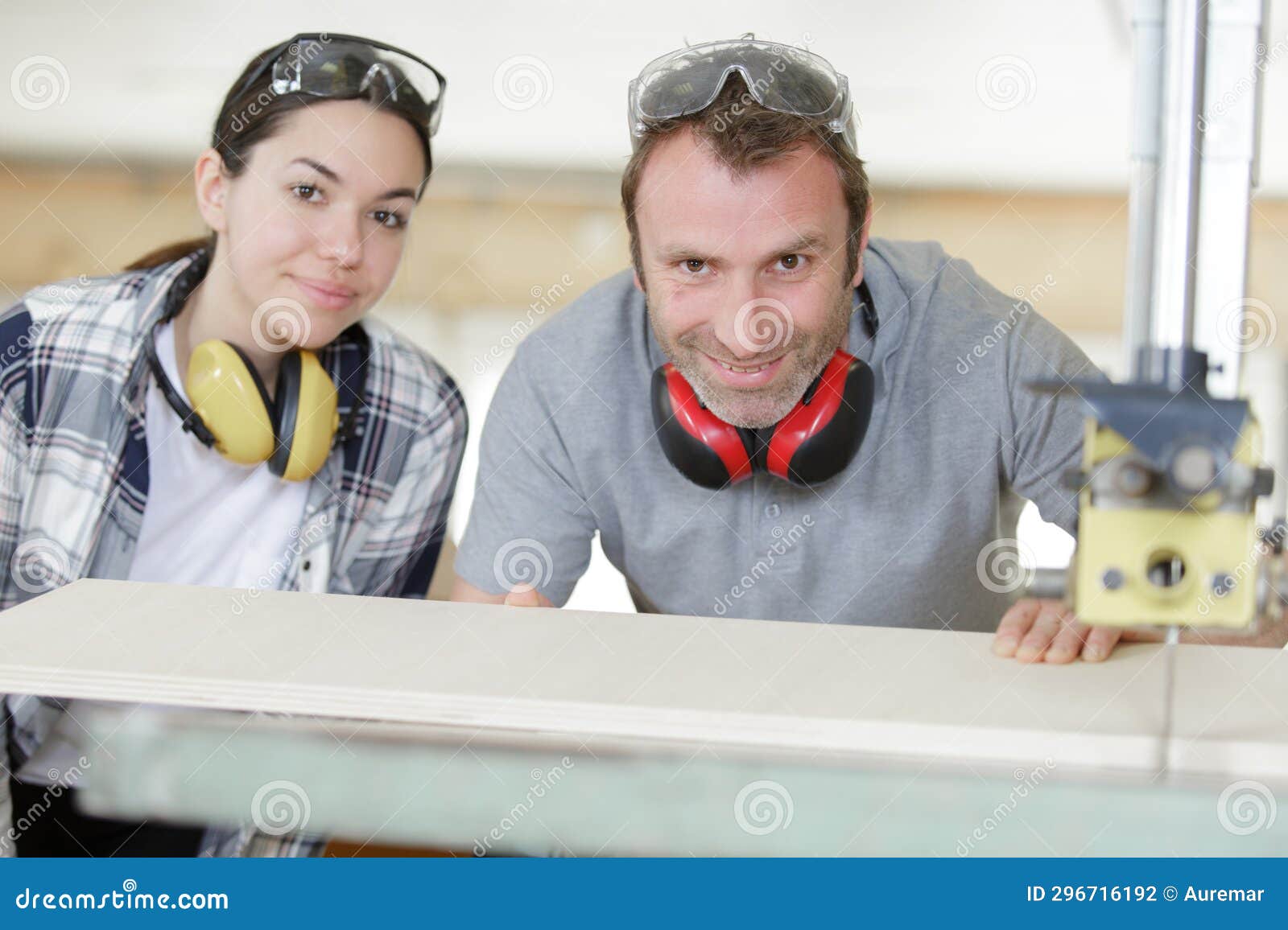Instructor Showing Trainee How To Use Sawing Machine Stock Photo ...