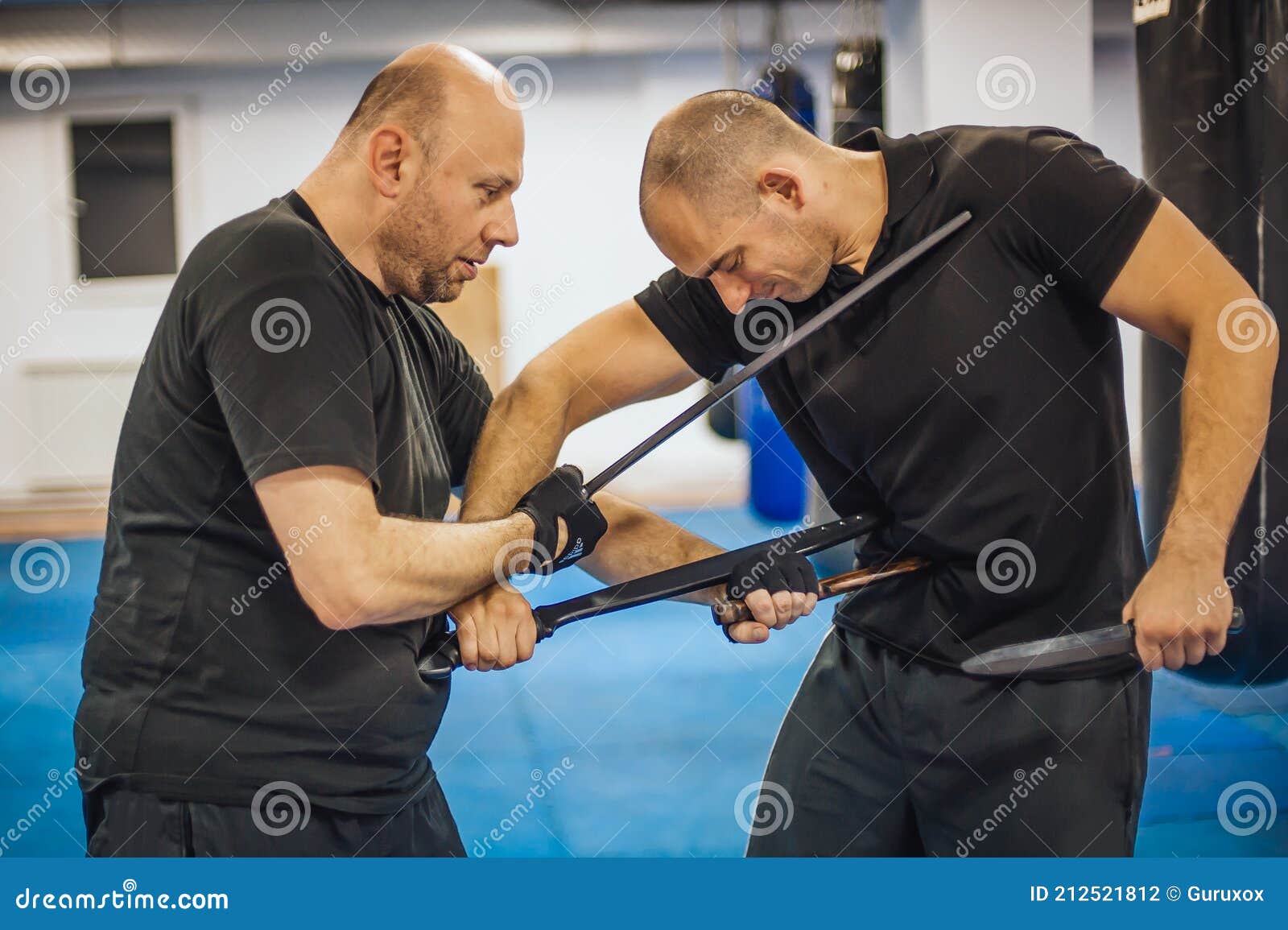 Instructor and Student Practice Long Sword and Knife Fighting Technique ...