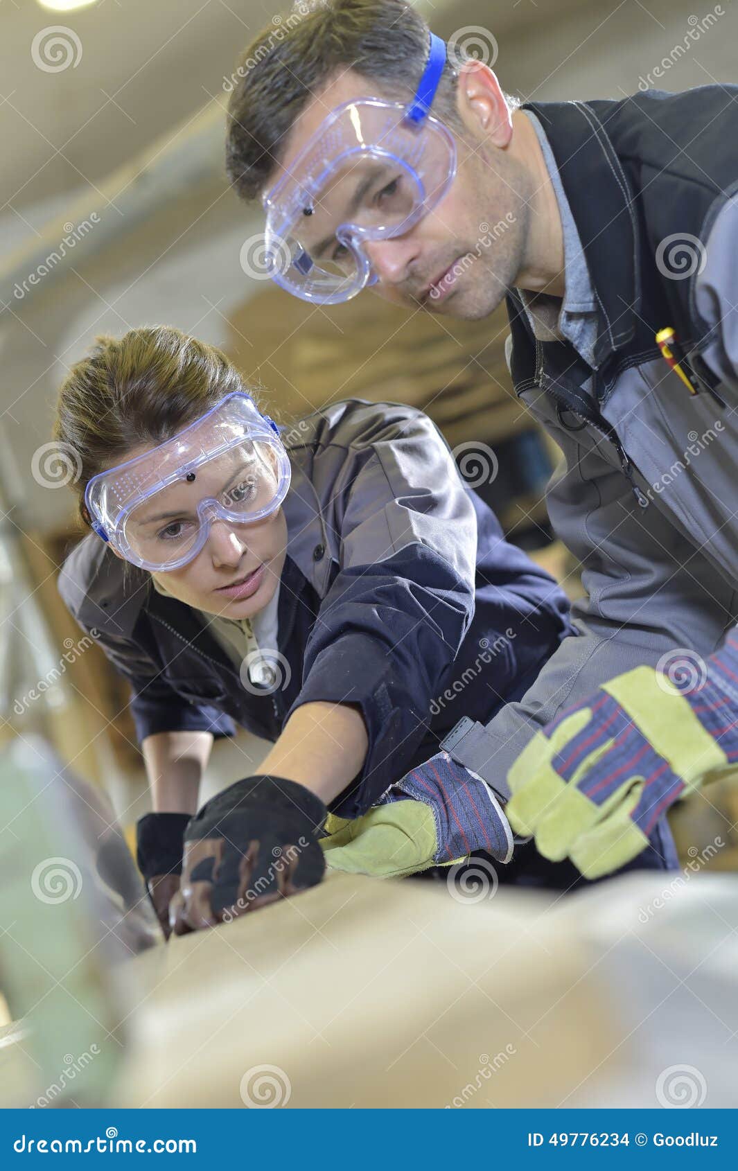 Instructor Teaching Carpentry Skills To Trainee Stock Photo - Image of ...