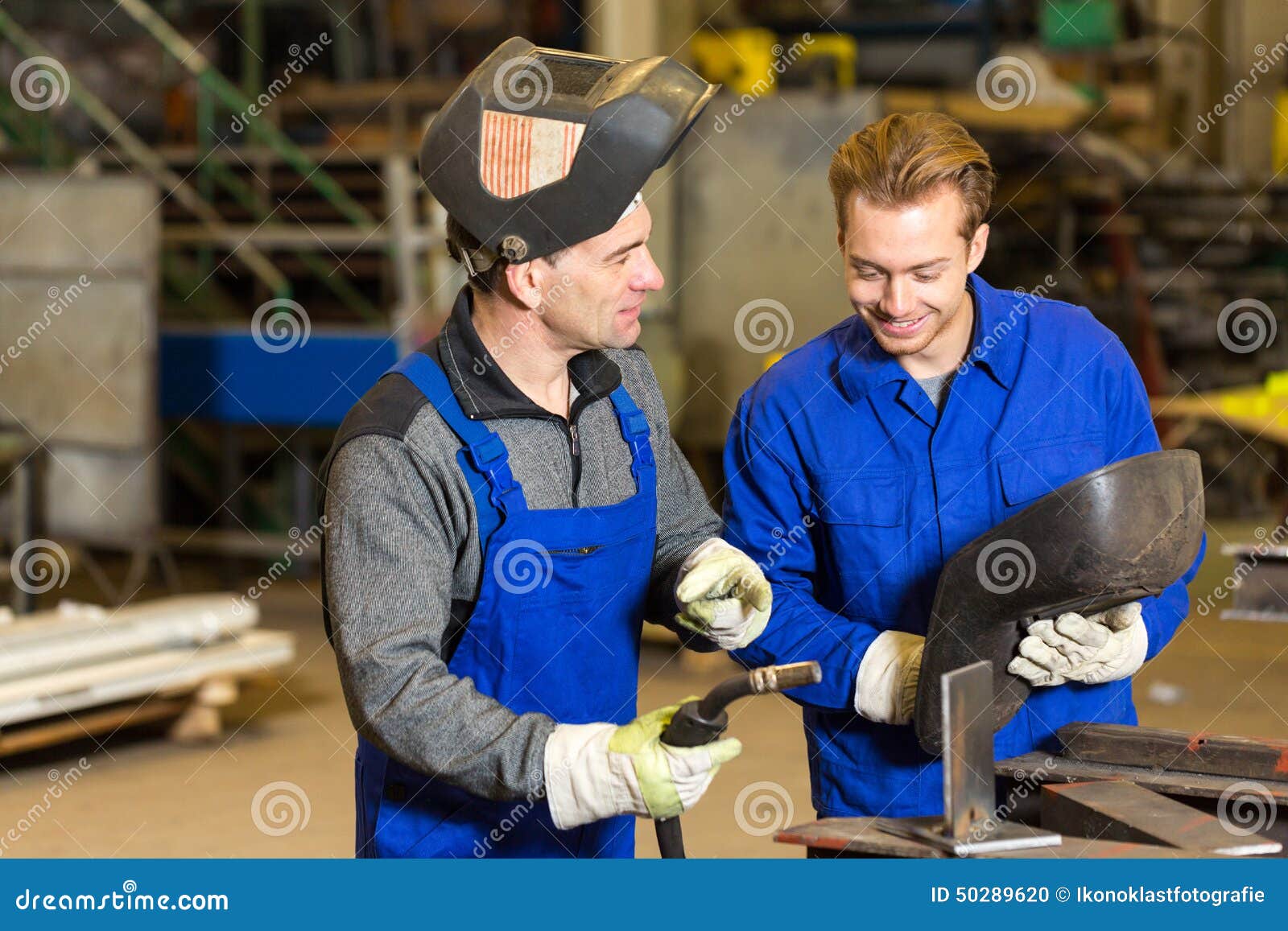 Instructor Teaching Trainee How To Weld Metal Stock Photo - Image of ...
