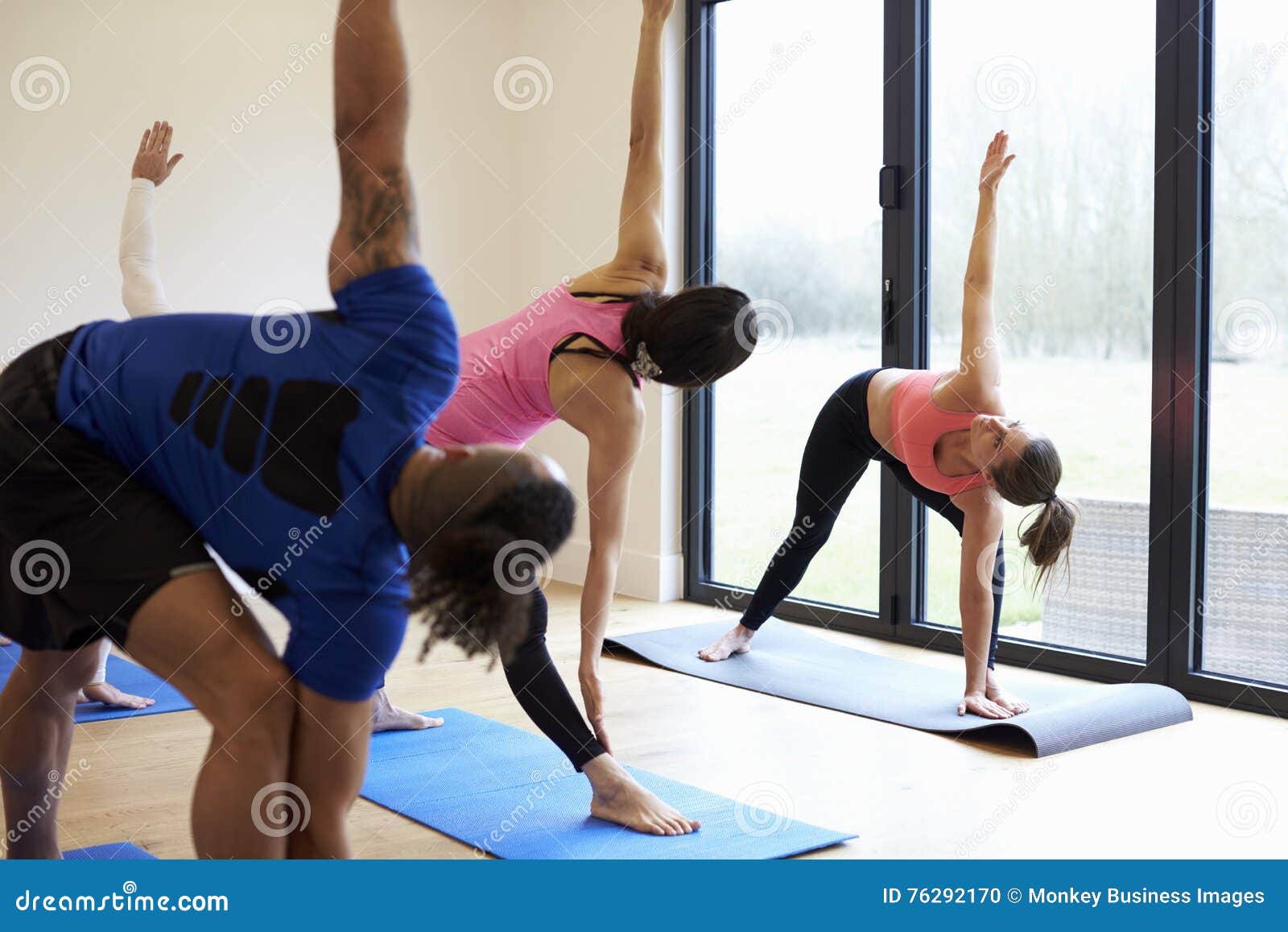 Instructor with Yoga Class at Gym Stock Photo - Image of forties ...