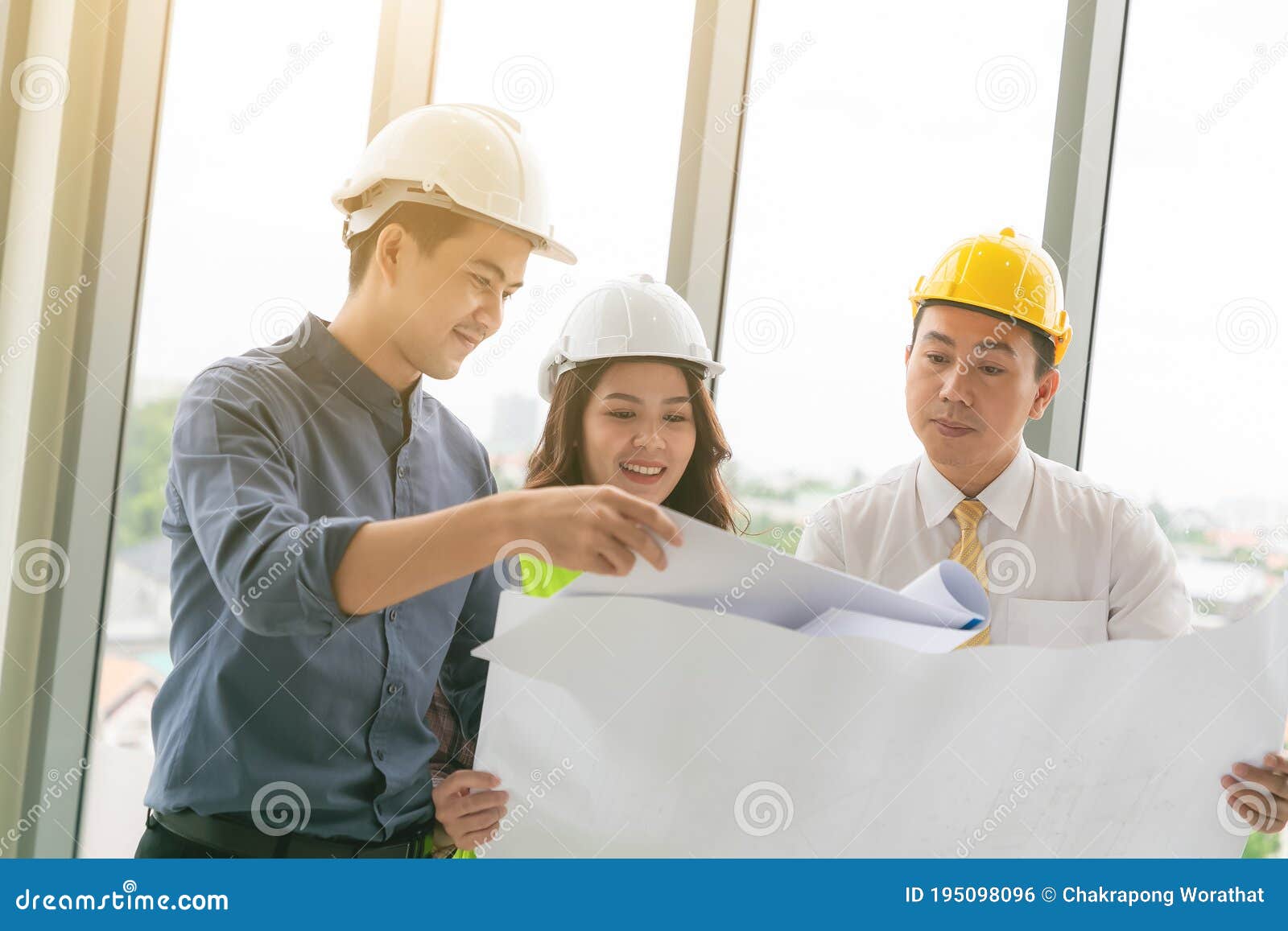 Instructor with Young People in Engineering Training in Construction on ...