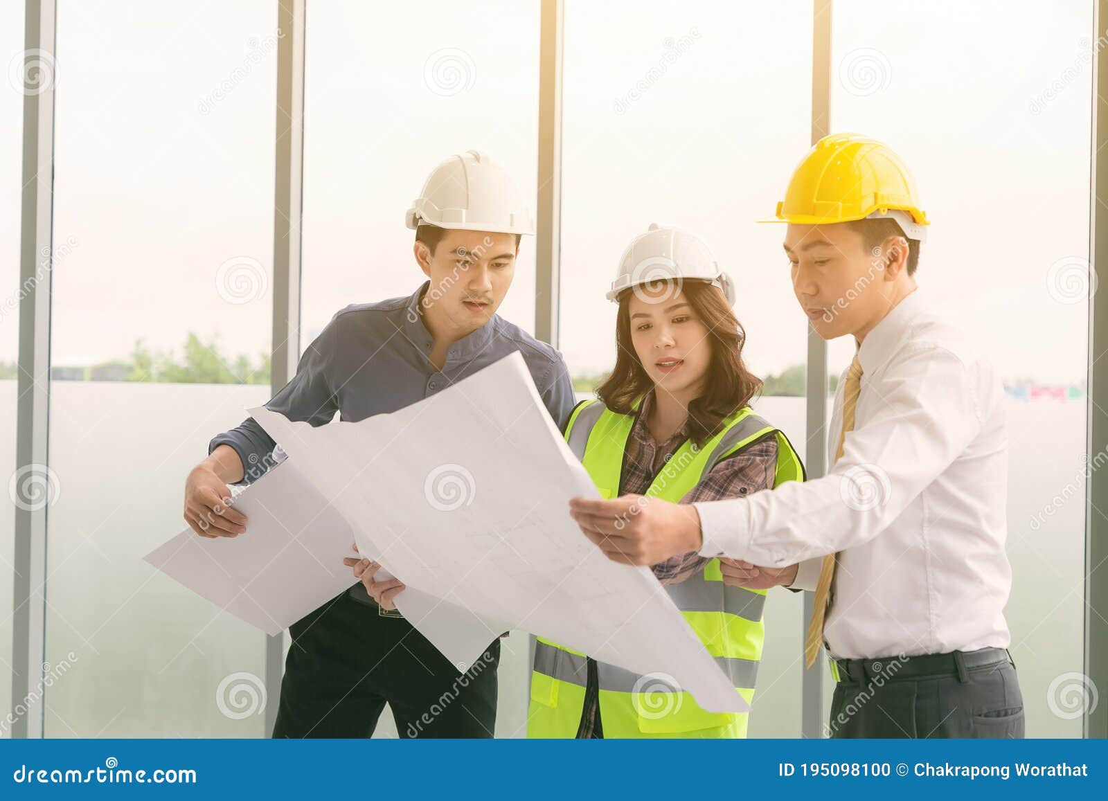 Instructor with Young People in Engineering Training in Construction on ...