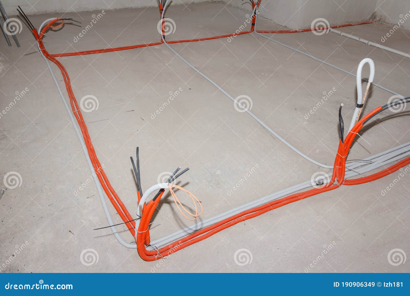 Insulated Electric Cables are Installed on the Floor in a Building ...