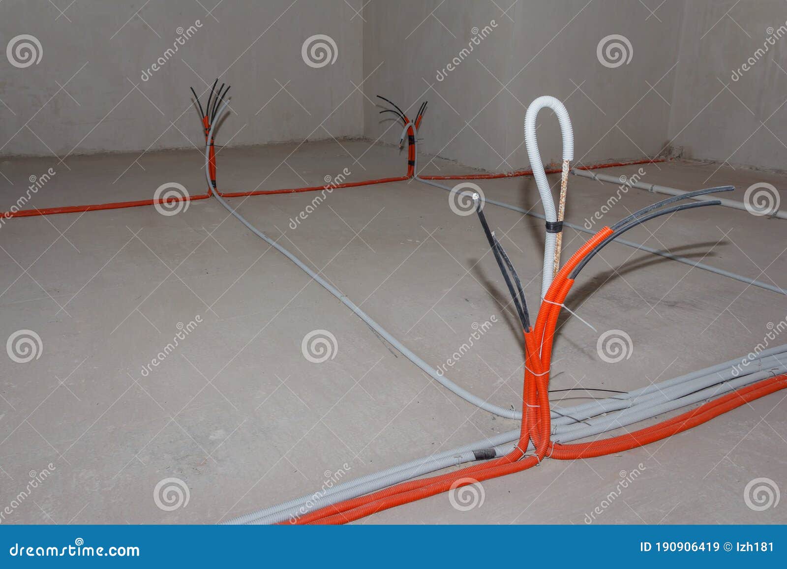 Insulated Electric Cables are Installed on the Floor in a Building ...