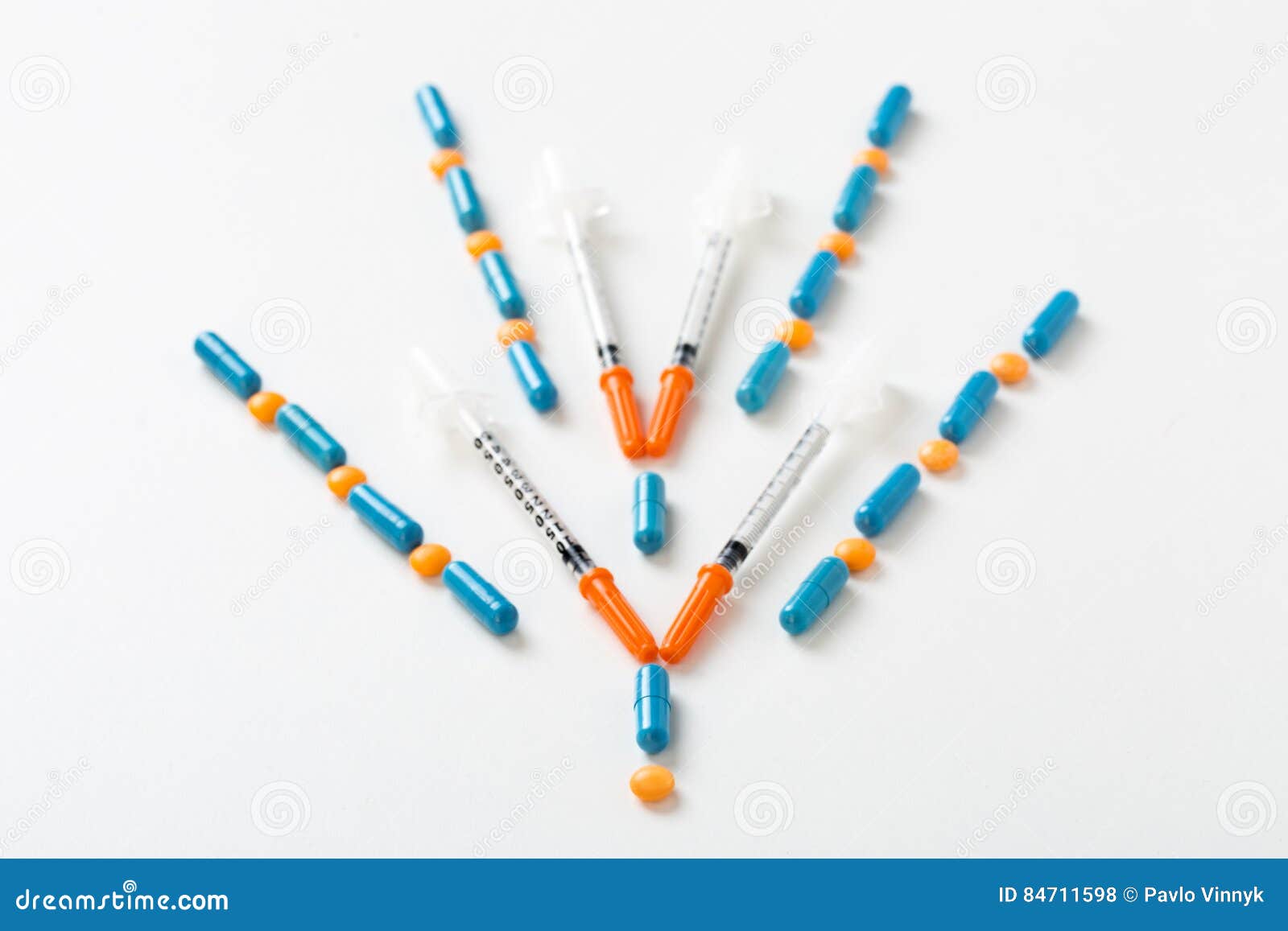 Insulin Syringe, Pills and Capsules in Shape of Down Arrow Stock Photo ...