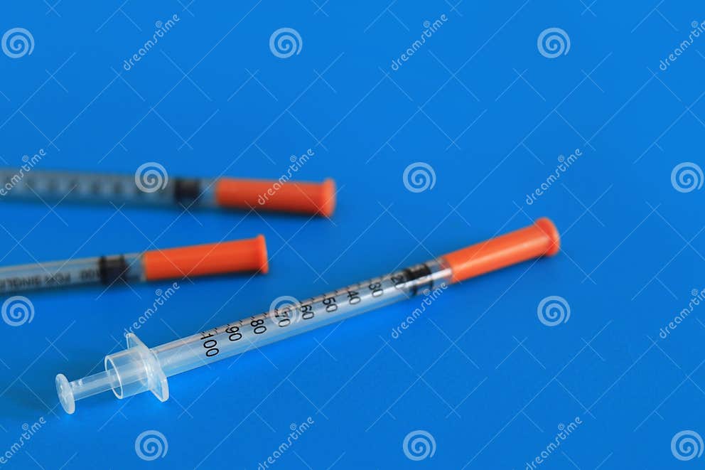 Insulin Syringes On A Blue Background Diabetes Treatment Stock Image Image Of Medicine