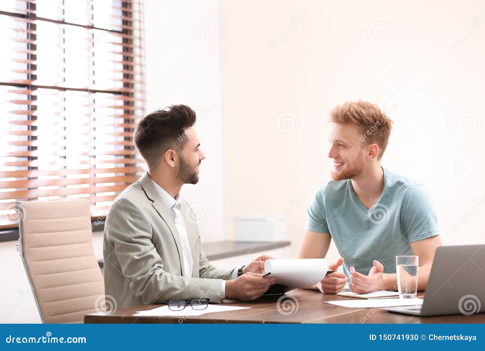 Insurance Agent Consulting Young Man Stock Photo - Image of discussion ...