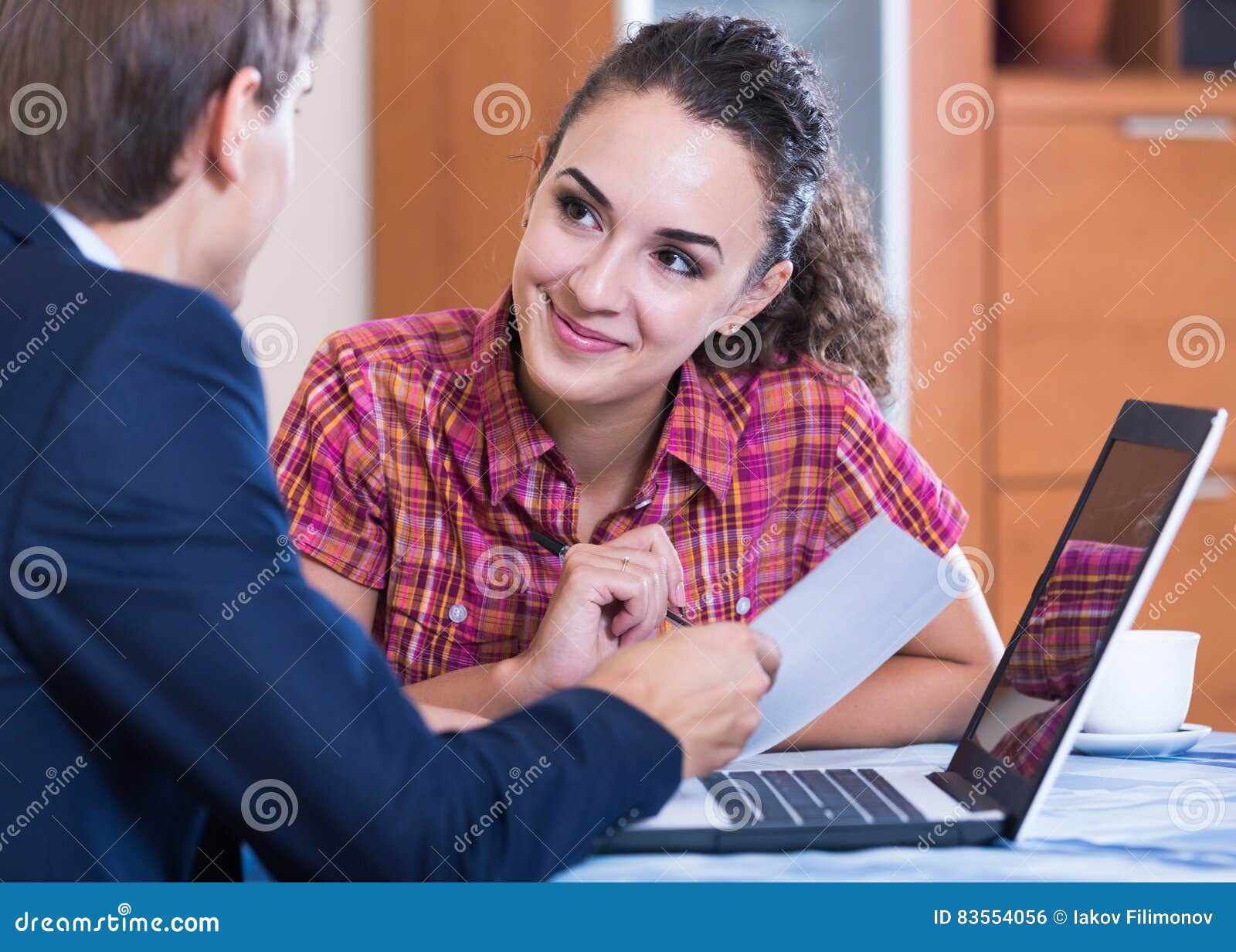 Insurance Agent and Customer Discussing Agreement Terms Stock Photo ...