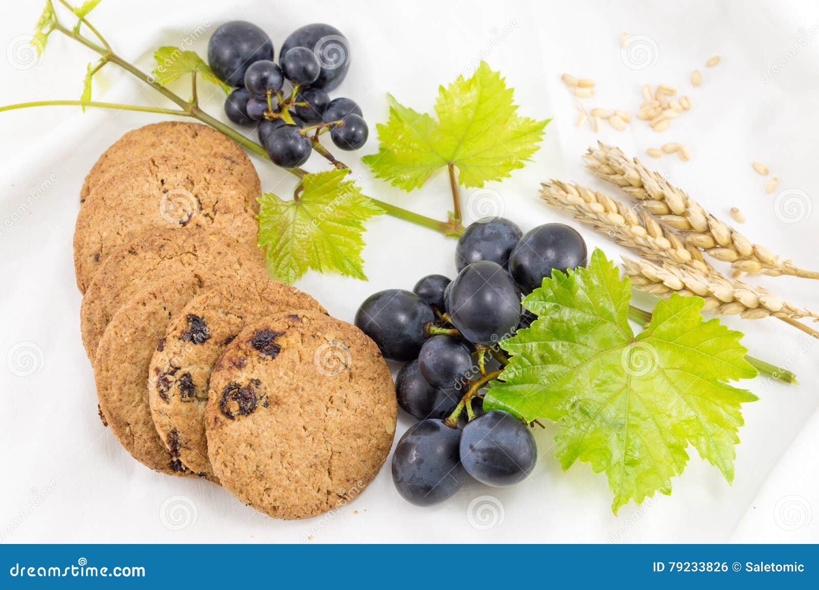 Integral Cookies with Grapes on White Stock Photo - Image of raisins ...
