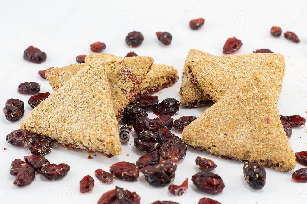Integral Triangle Cookies with Raisins on White Stock Photo - Image of ...