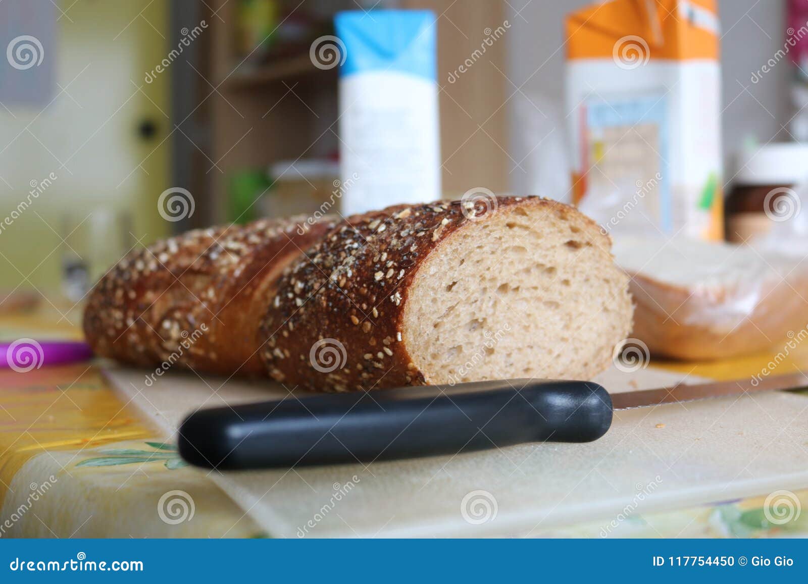 Integral Bread on Cutting Board with Knife Stock Photo - Image of ...