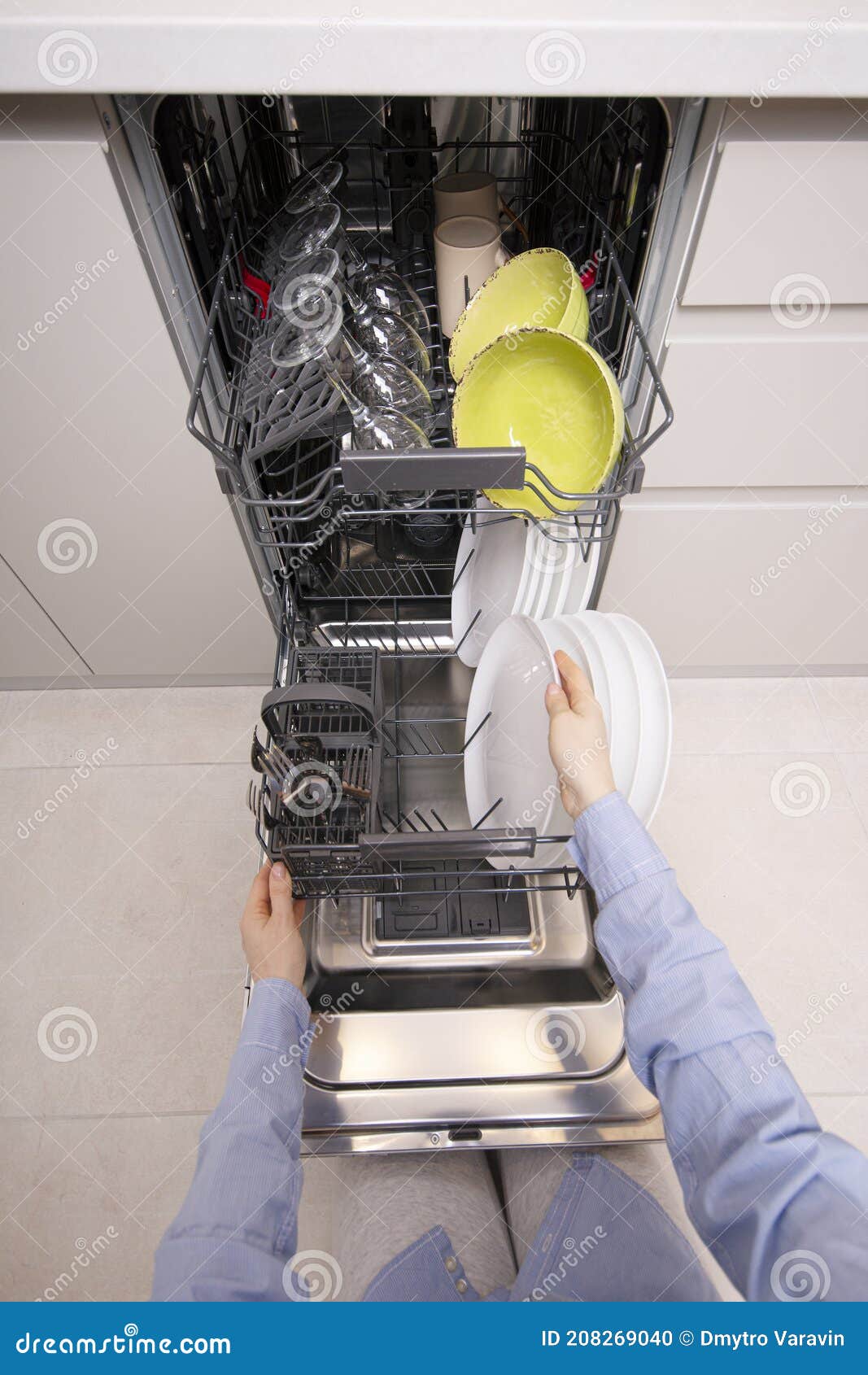 Integrated Dishwaher Machine Loading. Stock Photo - Image of ...