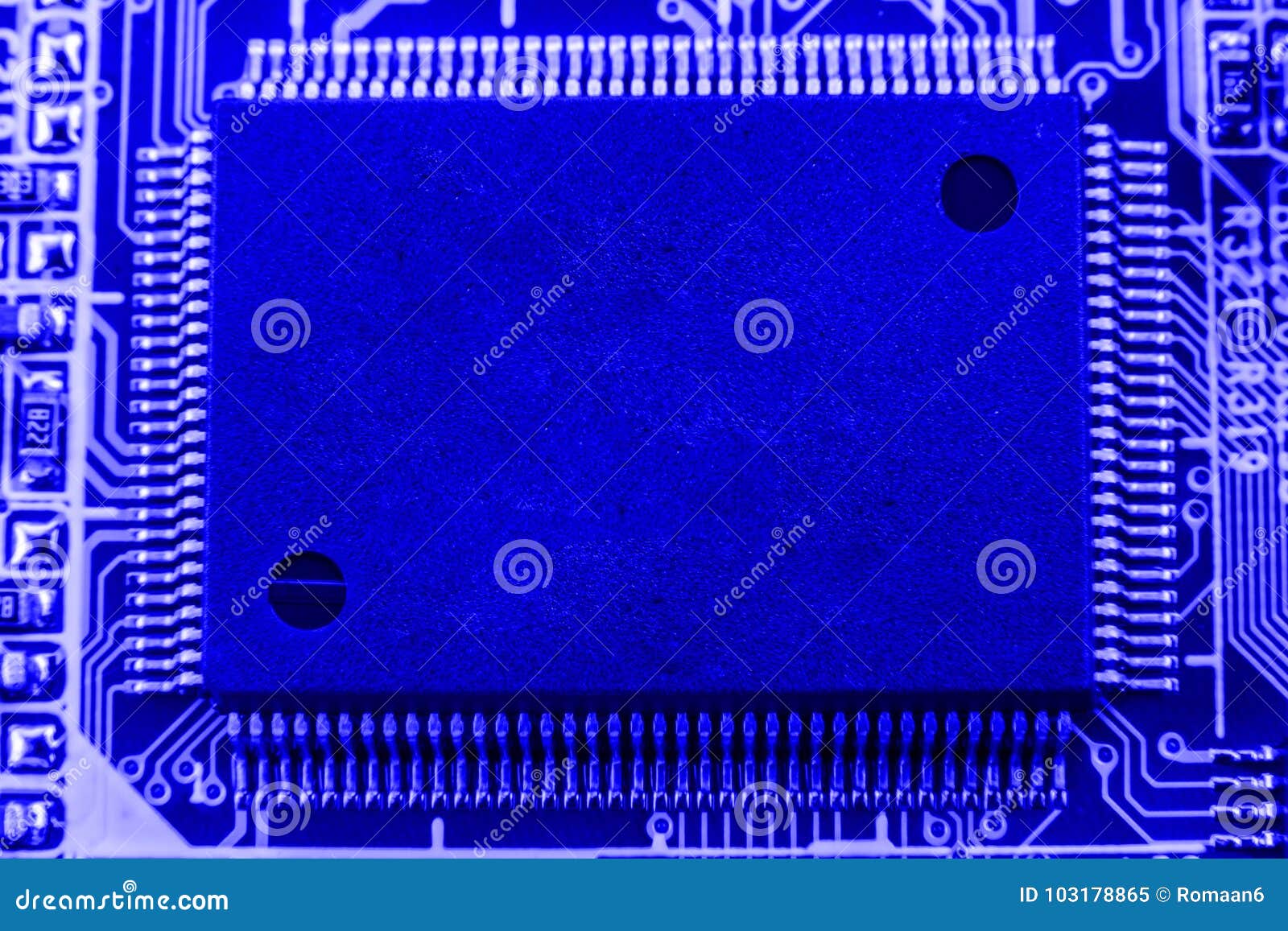 Integrated Semiconductor Microchip on Blue Circuit Board Representative ...